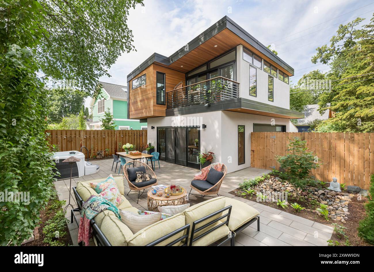 Modern ADU in backyard of house with large outdoor living space Stock ...