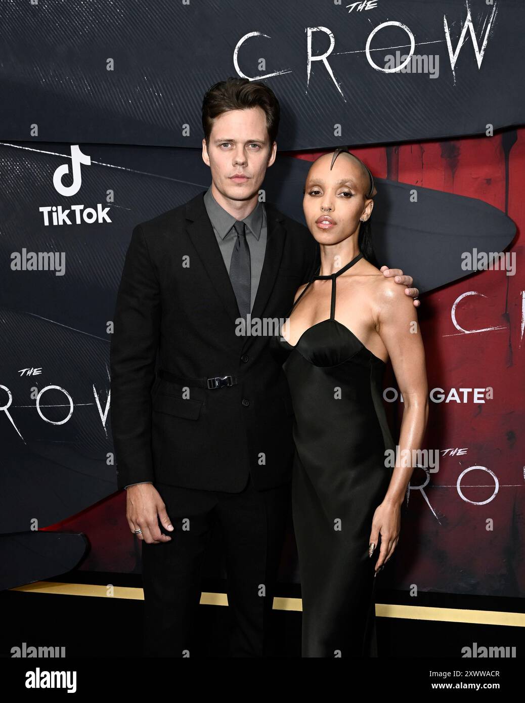 Bill Skarsgard, left, and FKA twigs attend "The Crow" world premiere at ...