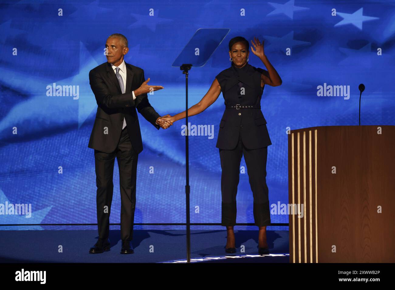 Former President Barack Obama, left, greets former first lady Michelle ...