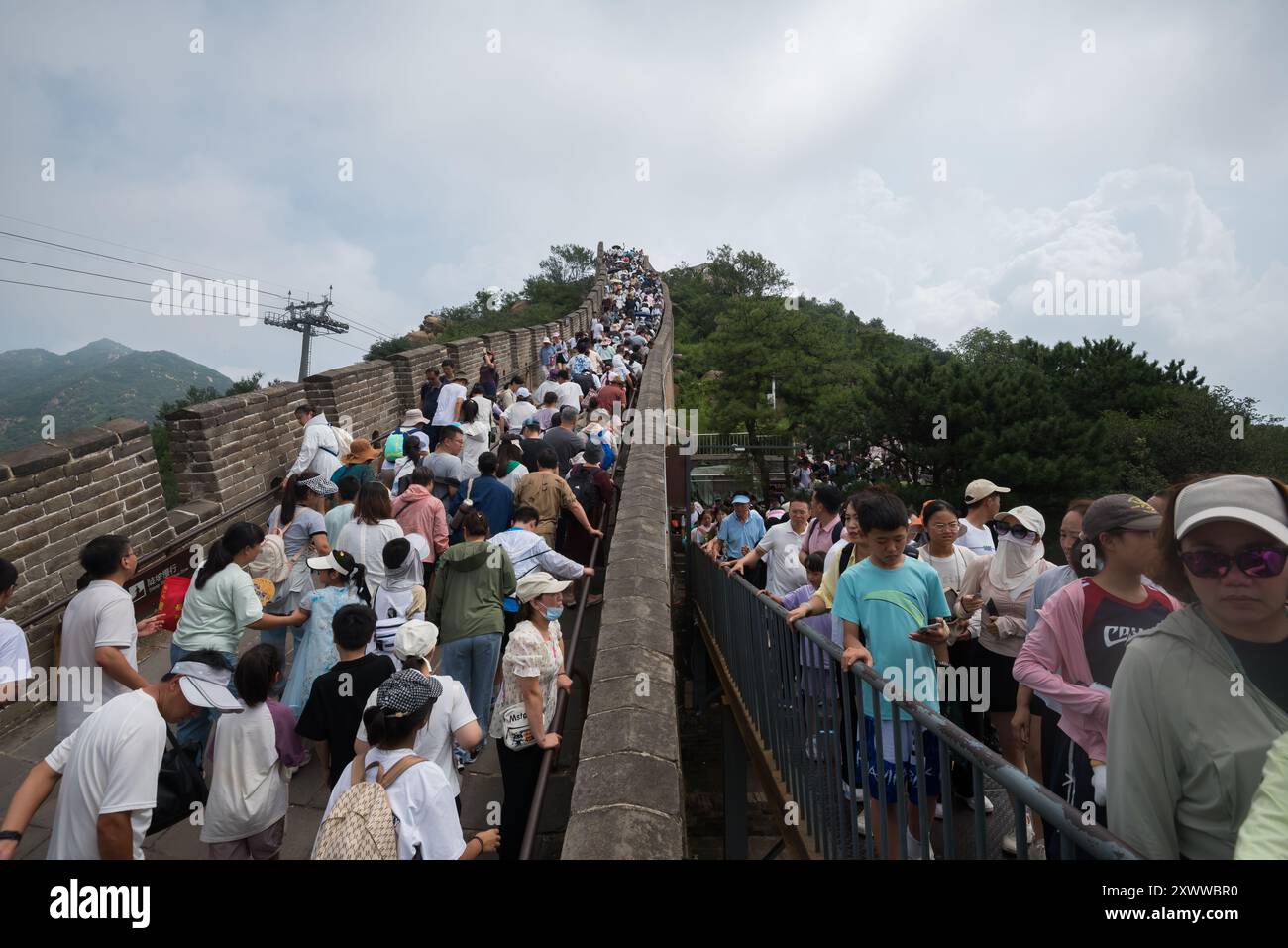 Beijing, China - August 15, 2024: Crowds of tourists visiting Badaling ...