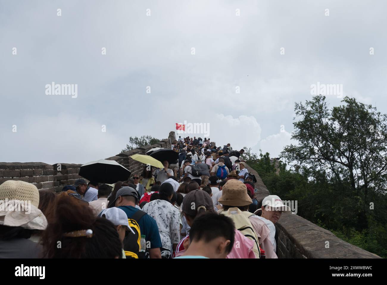 Beijing, China - August 15, 2024: Crowds of tourists visiting Badaling ...