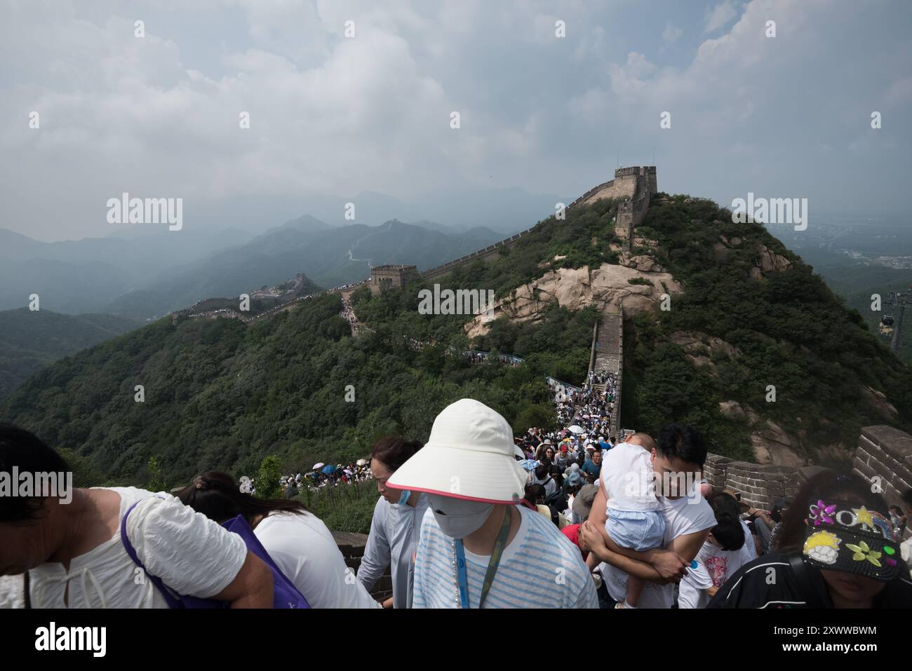 Beijing, China - August 15, 2024: Crowds of tourists visiting Badaling ...