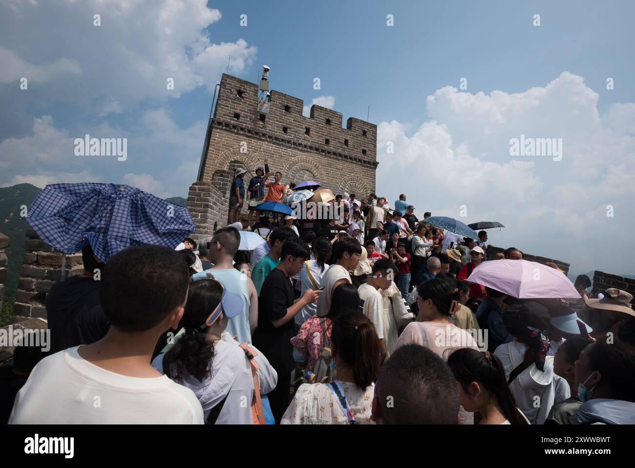 Beijing, China - August 15, 2024: Crowds of tourists visiting Badaling ...