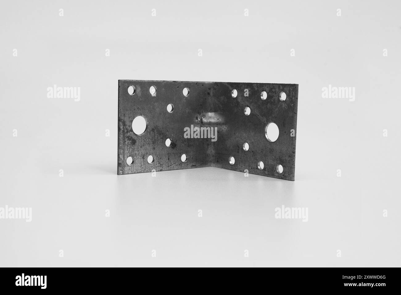 metal corner. Angular connecting element made of metal, with screw ...