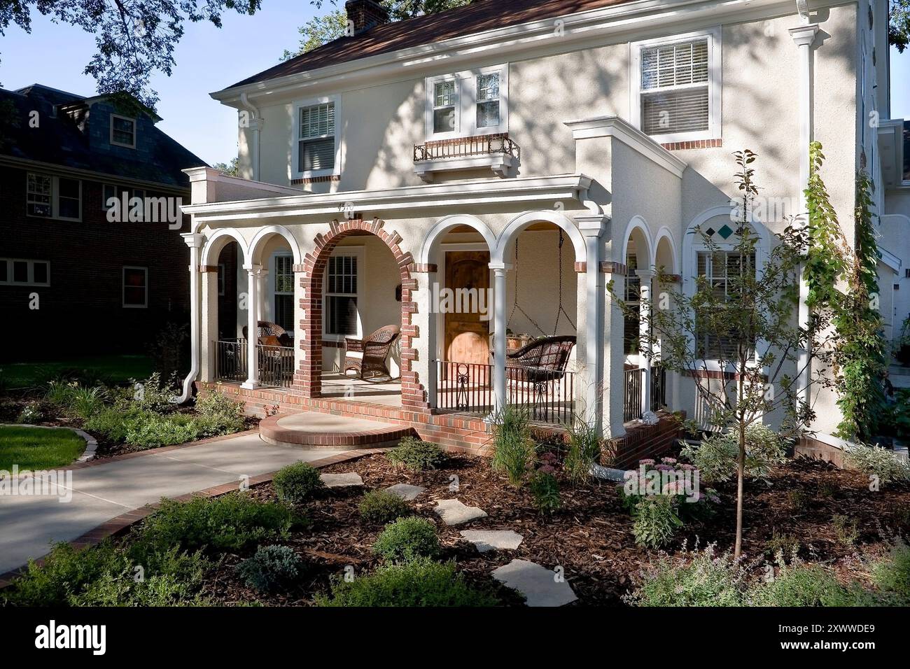 Arched entrance and openings on porch reflects arches over windo hi-res ...