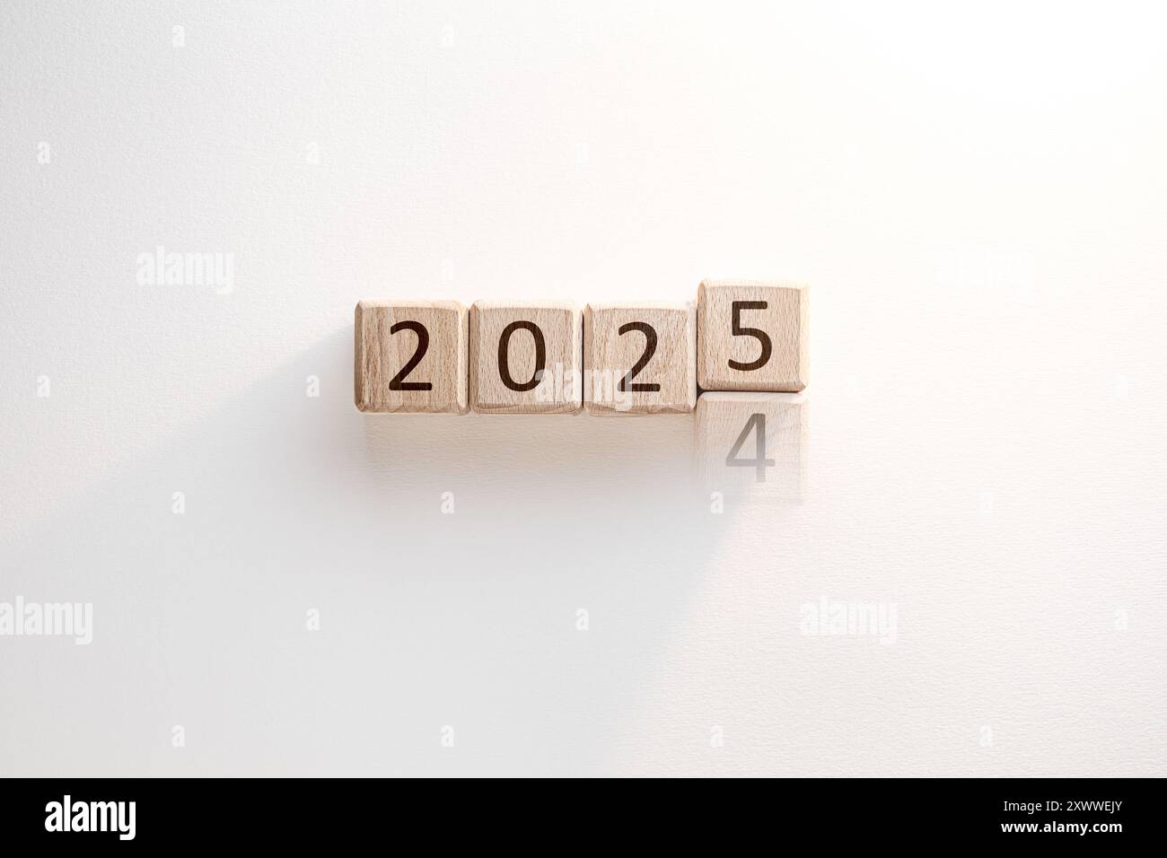 2025 Year Replacing 2024. 2025 loading Stock Photo - Alamy