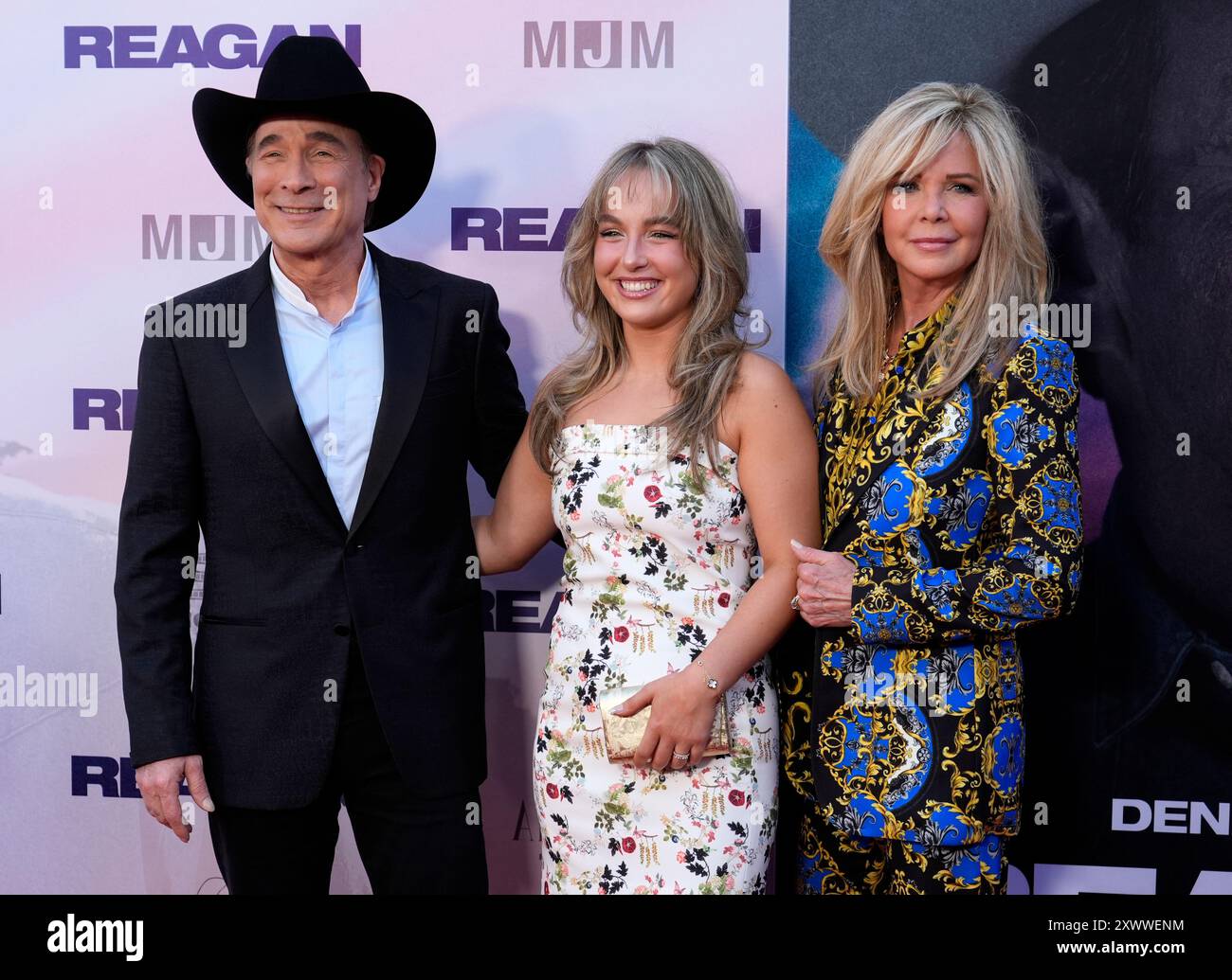 Country singer Clint Black, left, poses with his wife Lisa Hartman ...