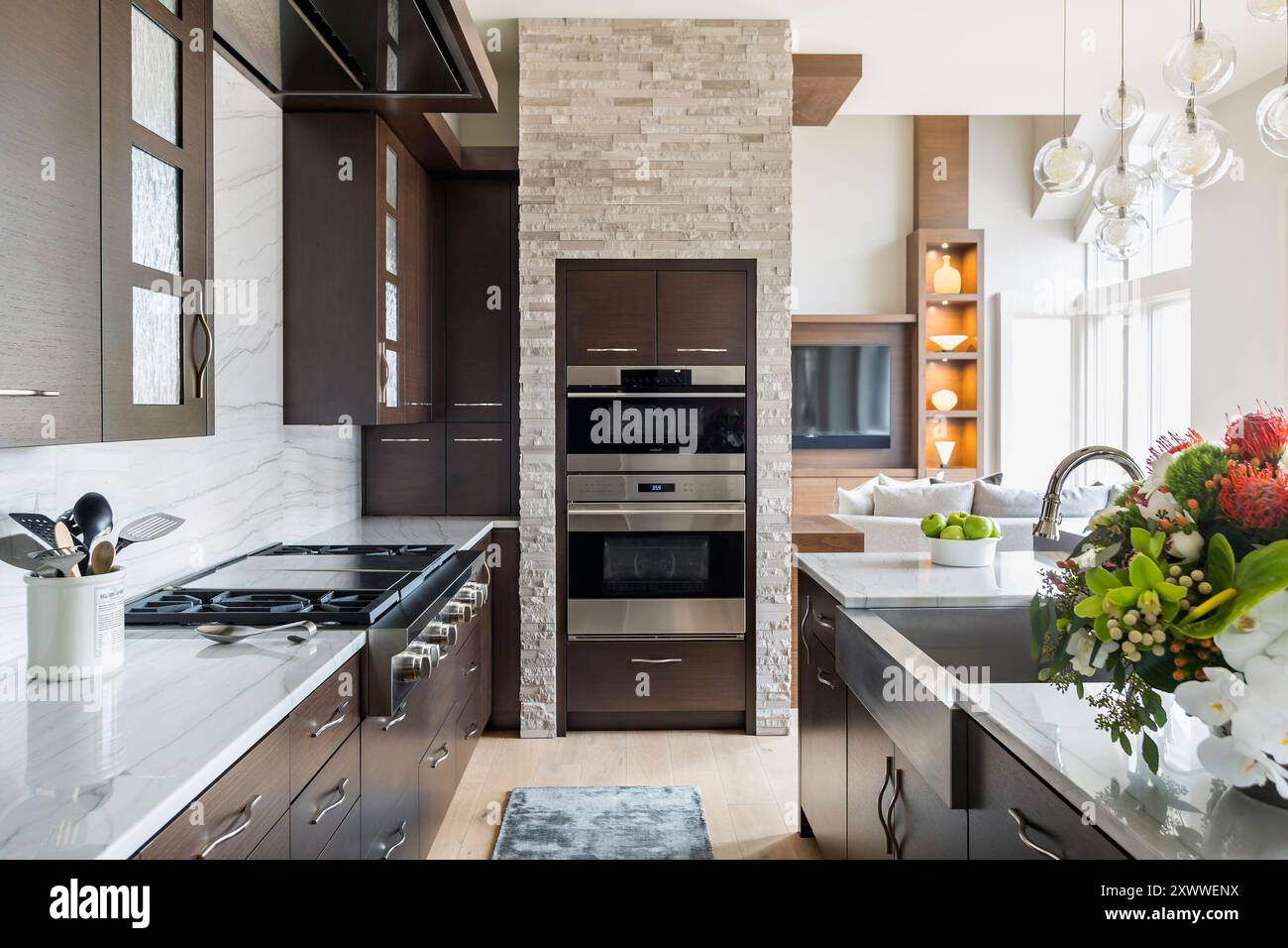 Wolf wall ovens inset in stone veneer wall section hi-res stock ...