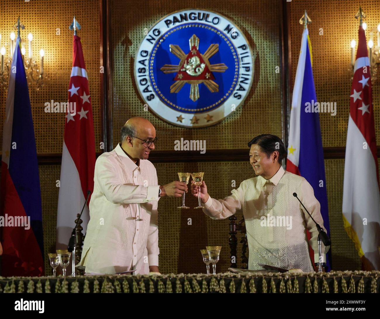 President Tharman Shanmugaratnam (left), and Philippine President ...