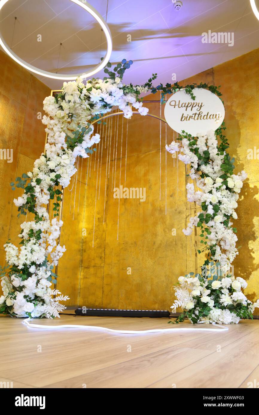 Restaurant interior. Photo zone in the restaurant. Floral design in a ...