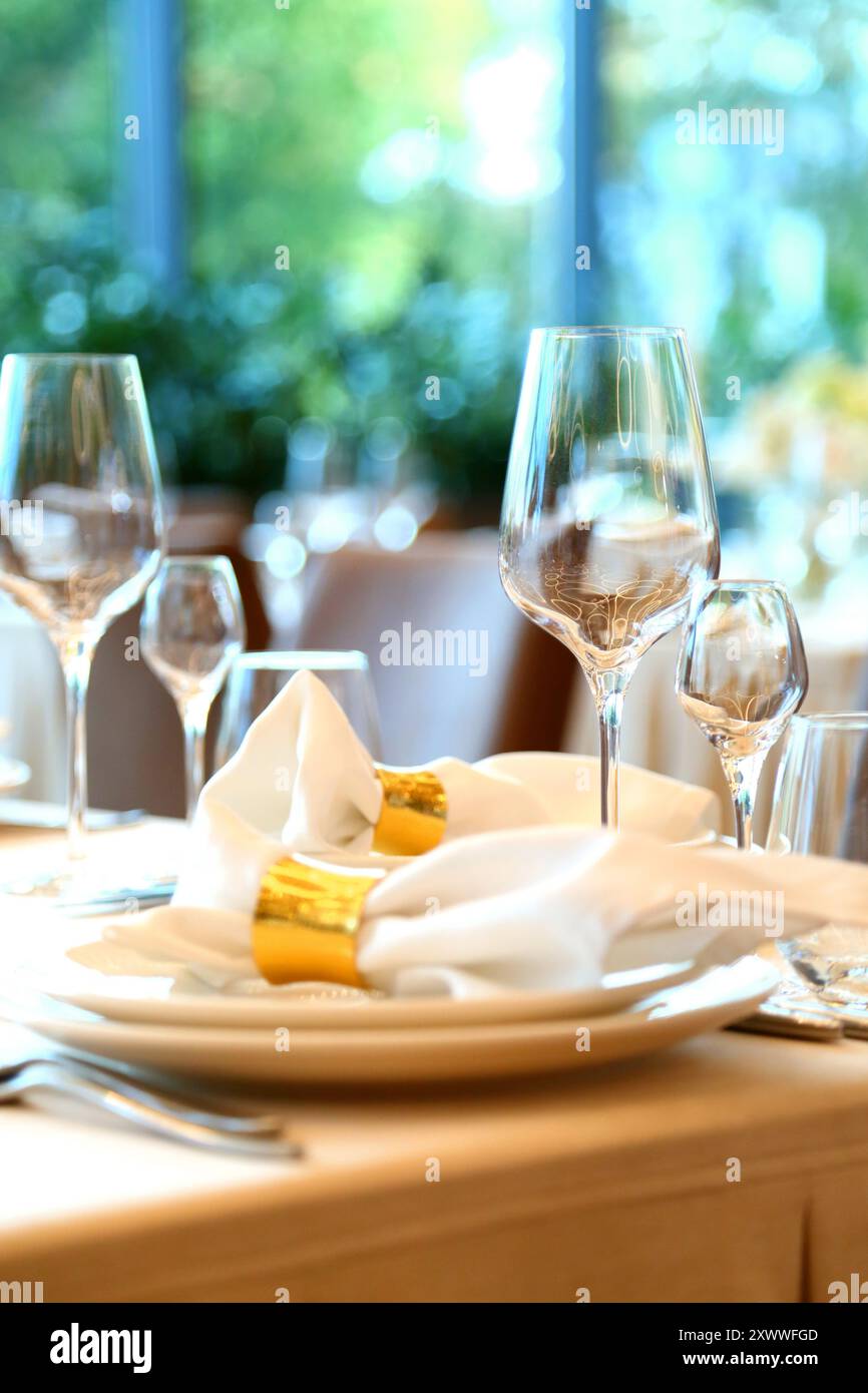 Table setting in a restaurant. Empty glasses set in restaurant. Table ...