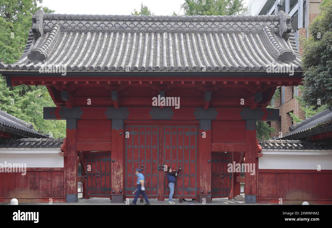A red gate known as the Akamon Gate, a national treasure of Japan, is ...