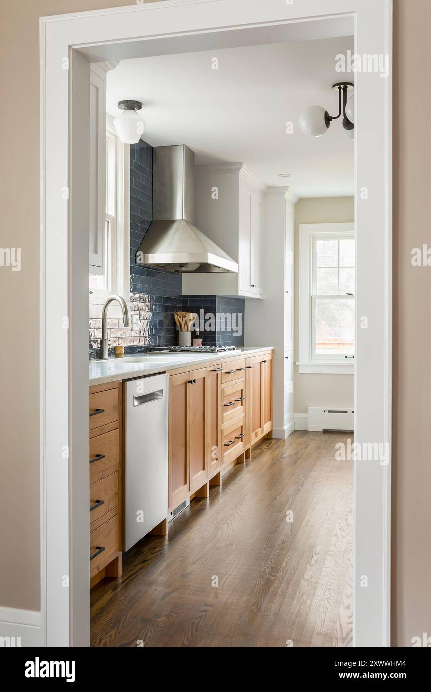 View through doorway into newly remodeled kitchen in older home with ...