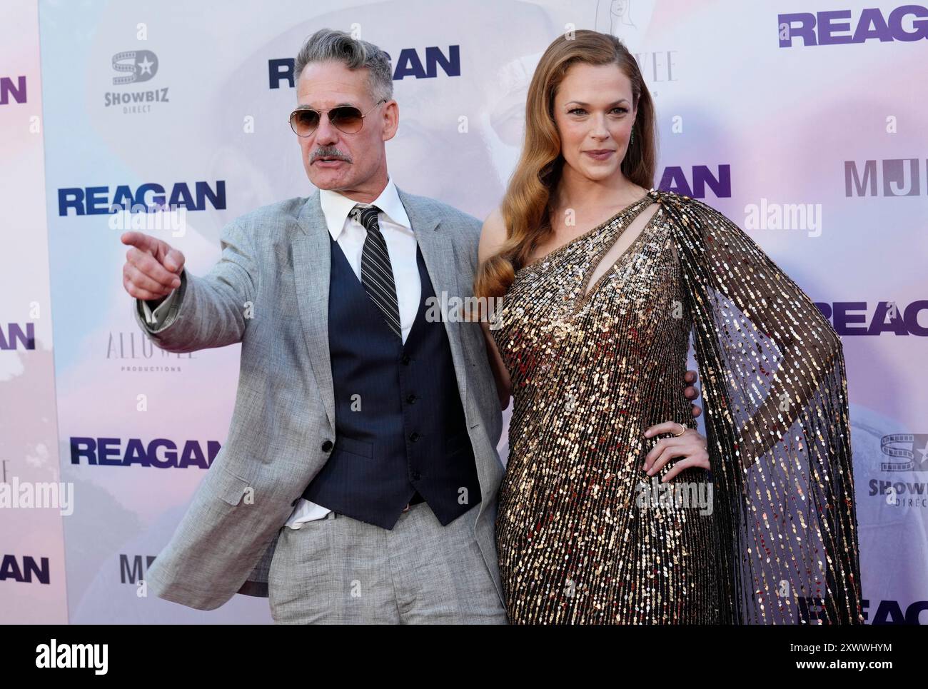 Amanda Righetti and Adrian Pasdar pose together at the premiere of the ...