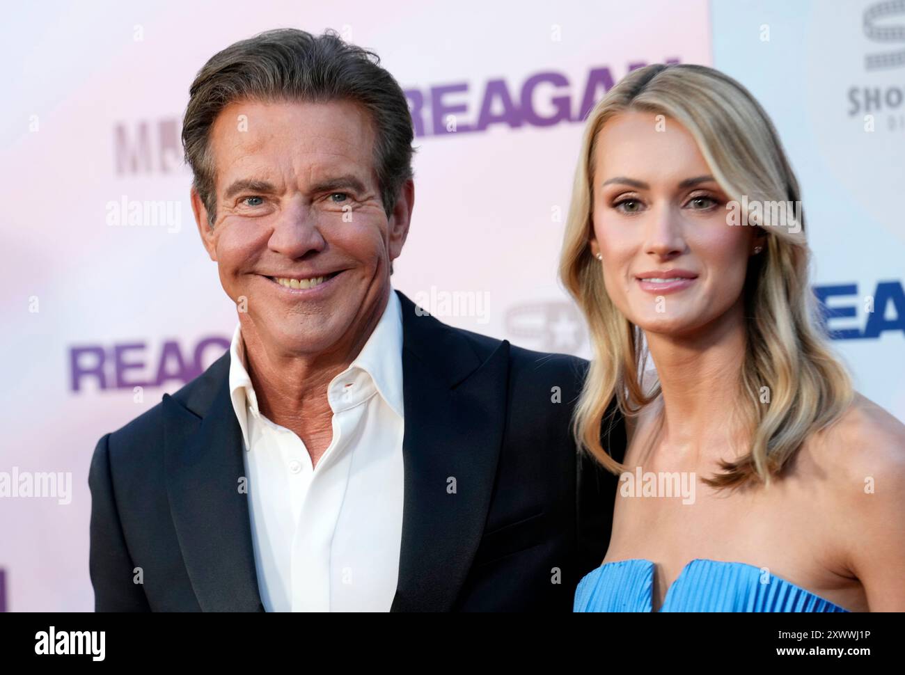 Dennis Quaid and his wife Laura Savoie pose together at the premiere of ...