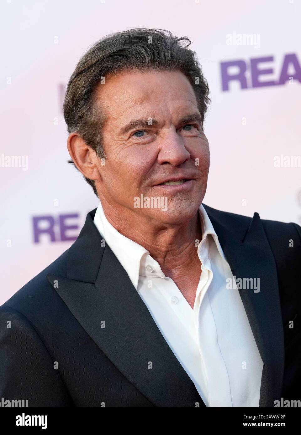 Dennis Quaid, left, and Penelope Ann Miller pose together at the ...