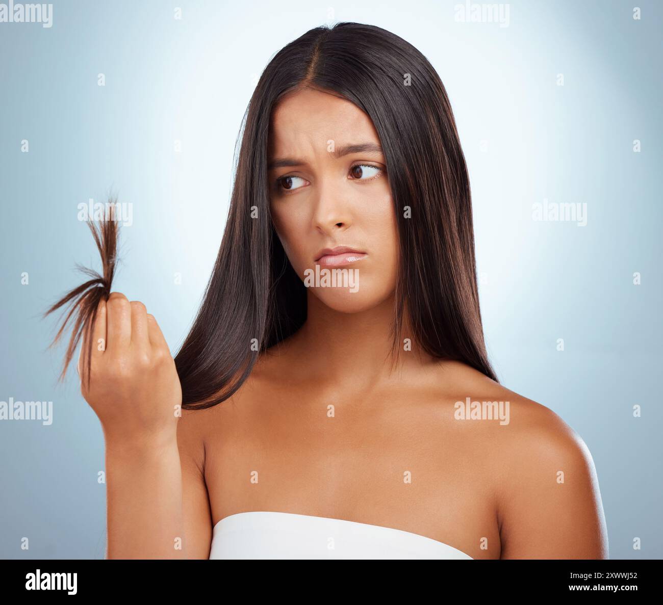 Hair care, studio and girl with split ends, texture and checking ...