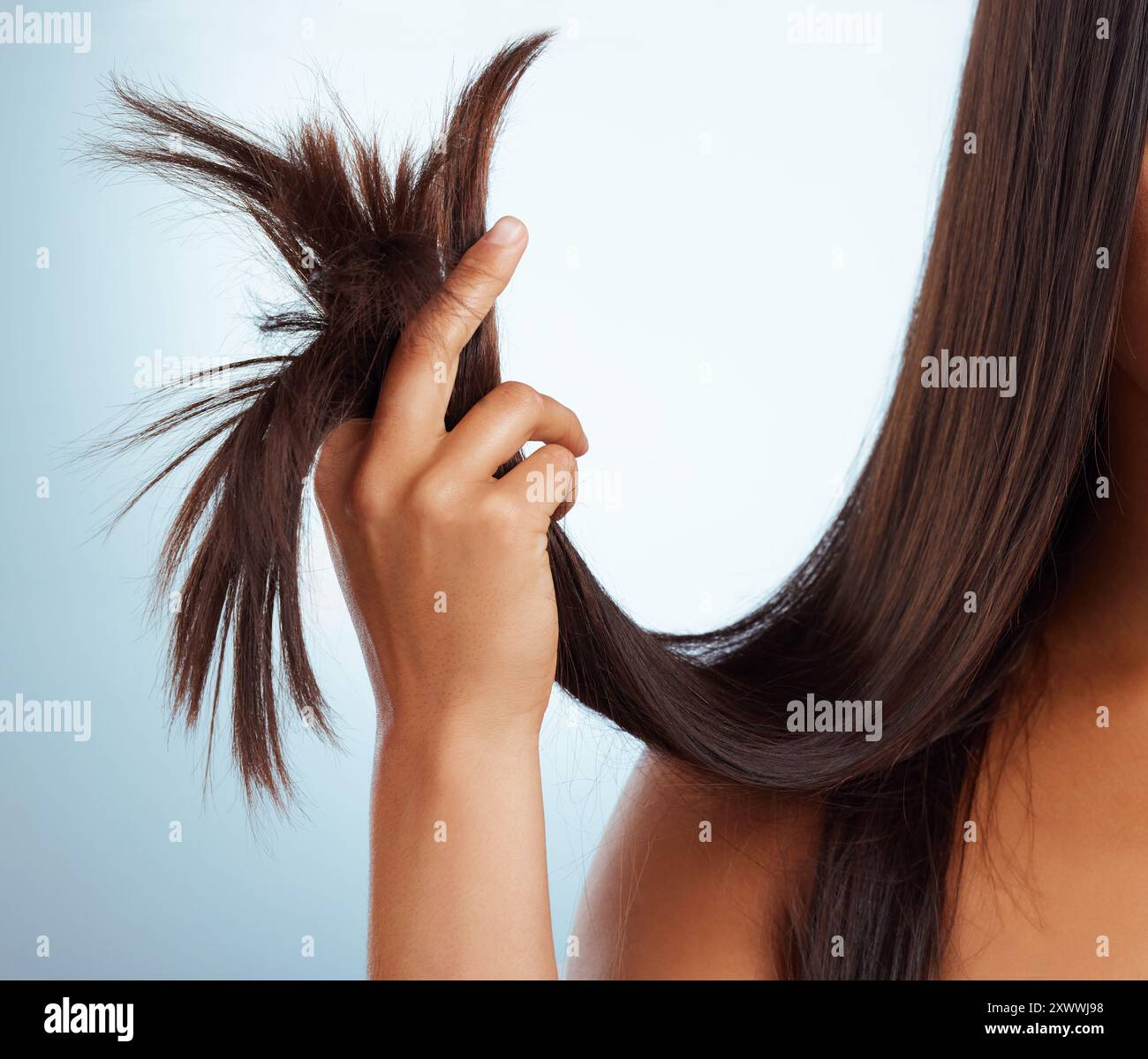 Haircare, woman and hands in salon with split ends from damage repair ...