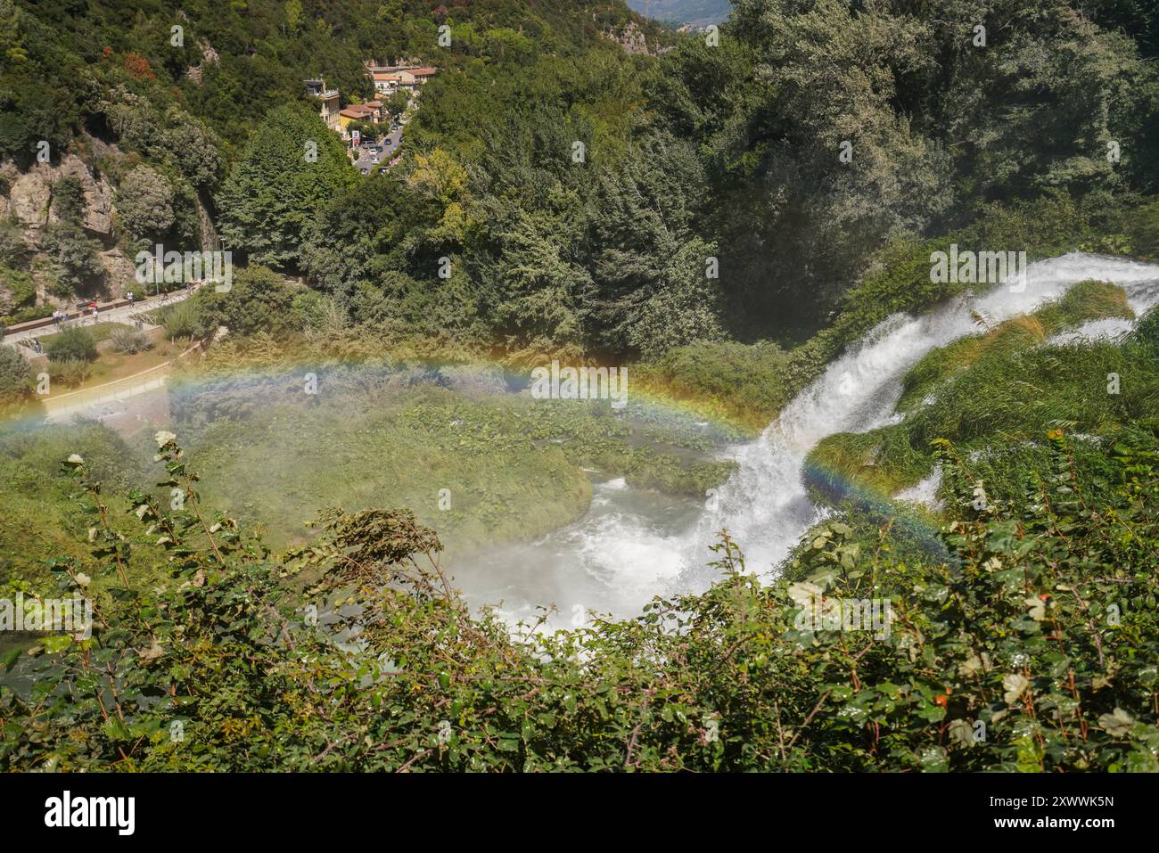 Terni, Italy. 20 August 2024. A rainbow arc over the stunning Marmore ...