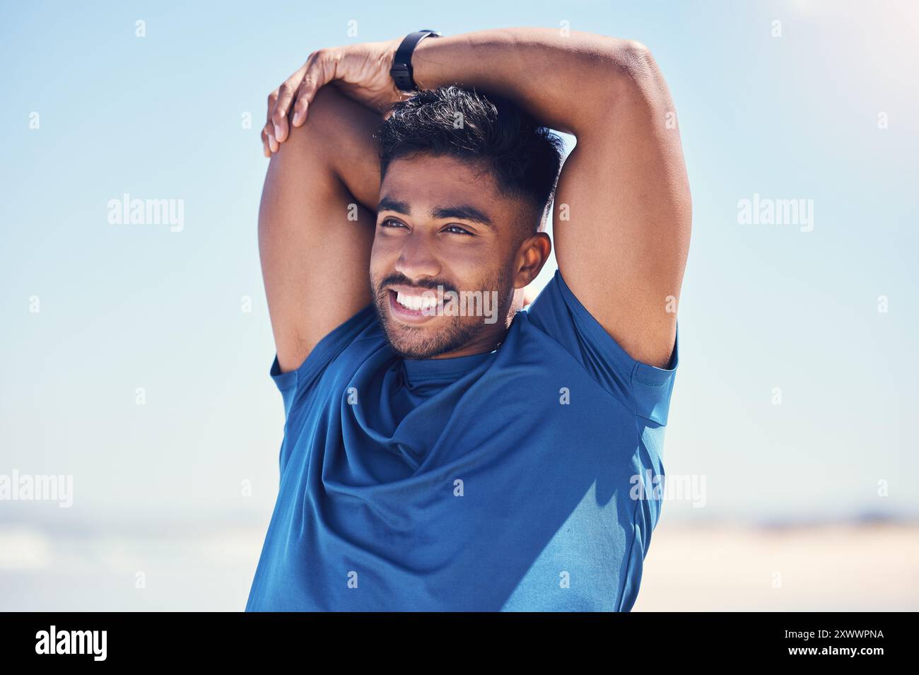 Man, thinking and stretching arms by beach for warm up, daily workout ...