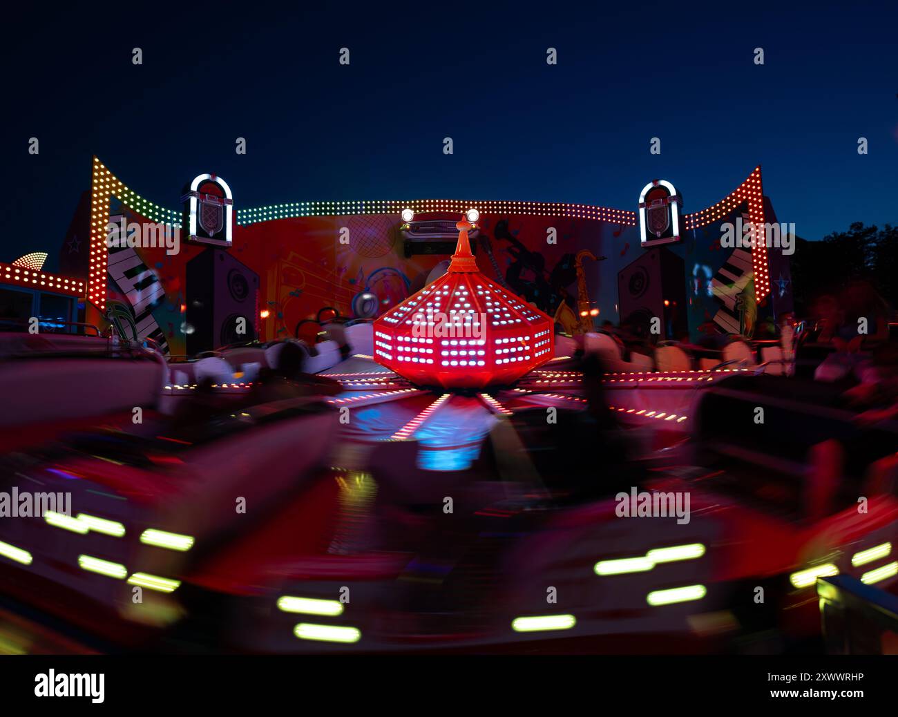 A colourful ferris wheel in Luna park during night. Horizontal photo of ...
