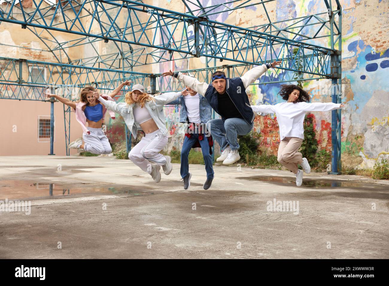 Group of people dancing hip hop outdoors Stock Photo - Alamy