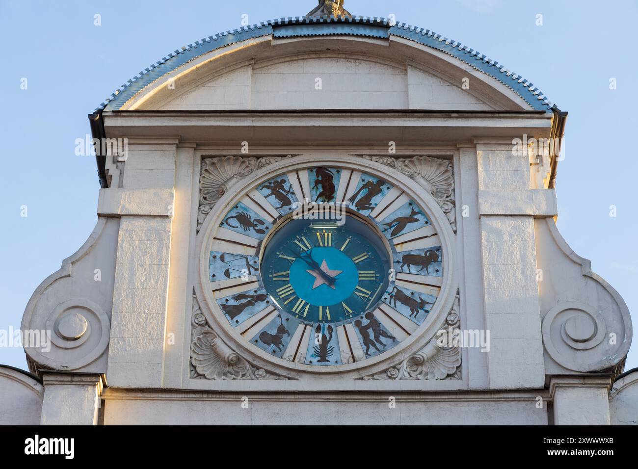 The tower clock with zodiac signs and Roman numerals was installed in ...