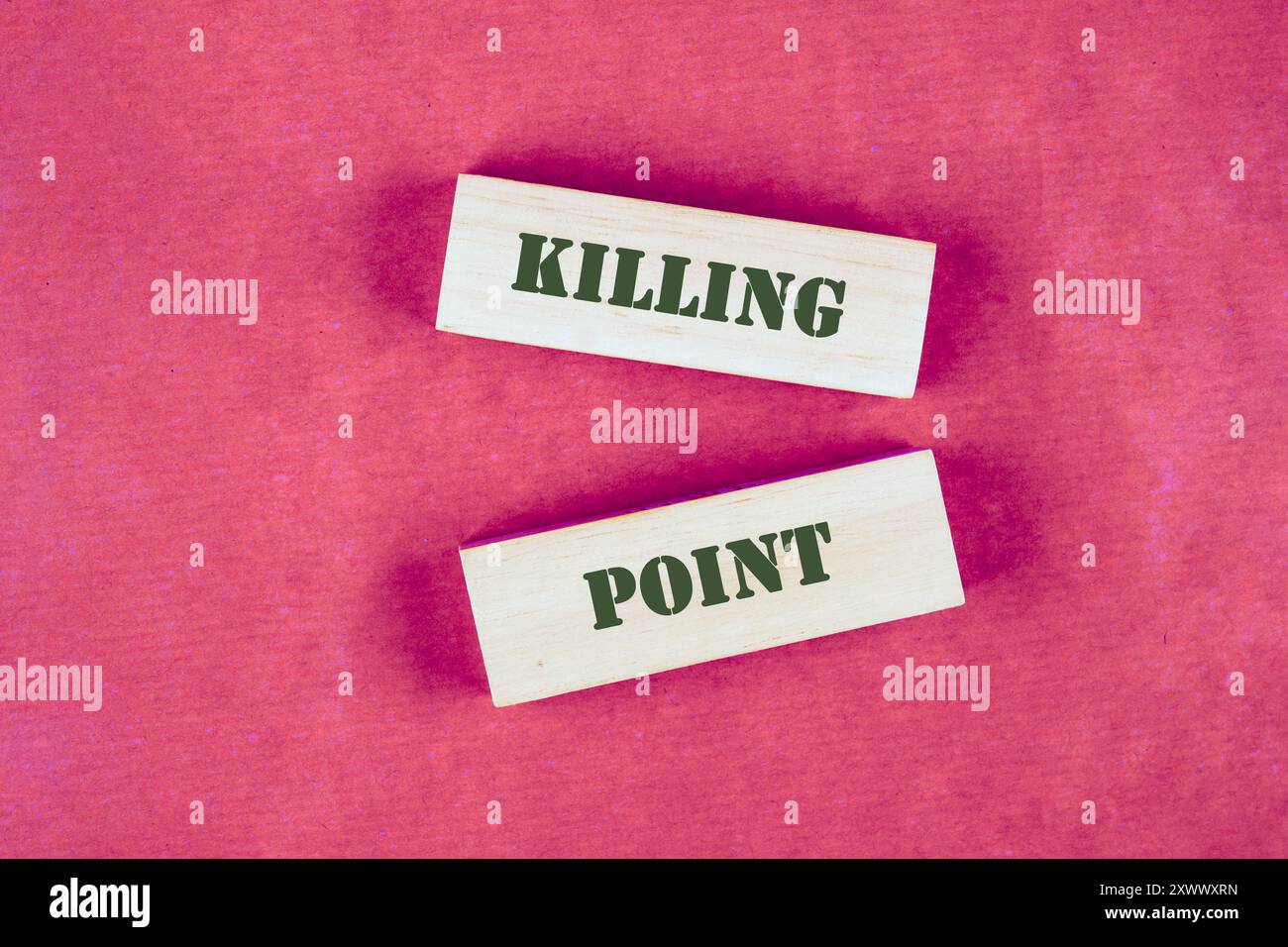 Word KILLING POINT Written the inscription is composed on a colored ...