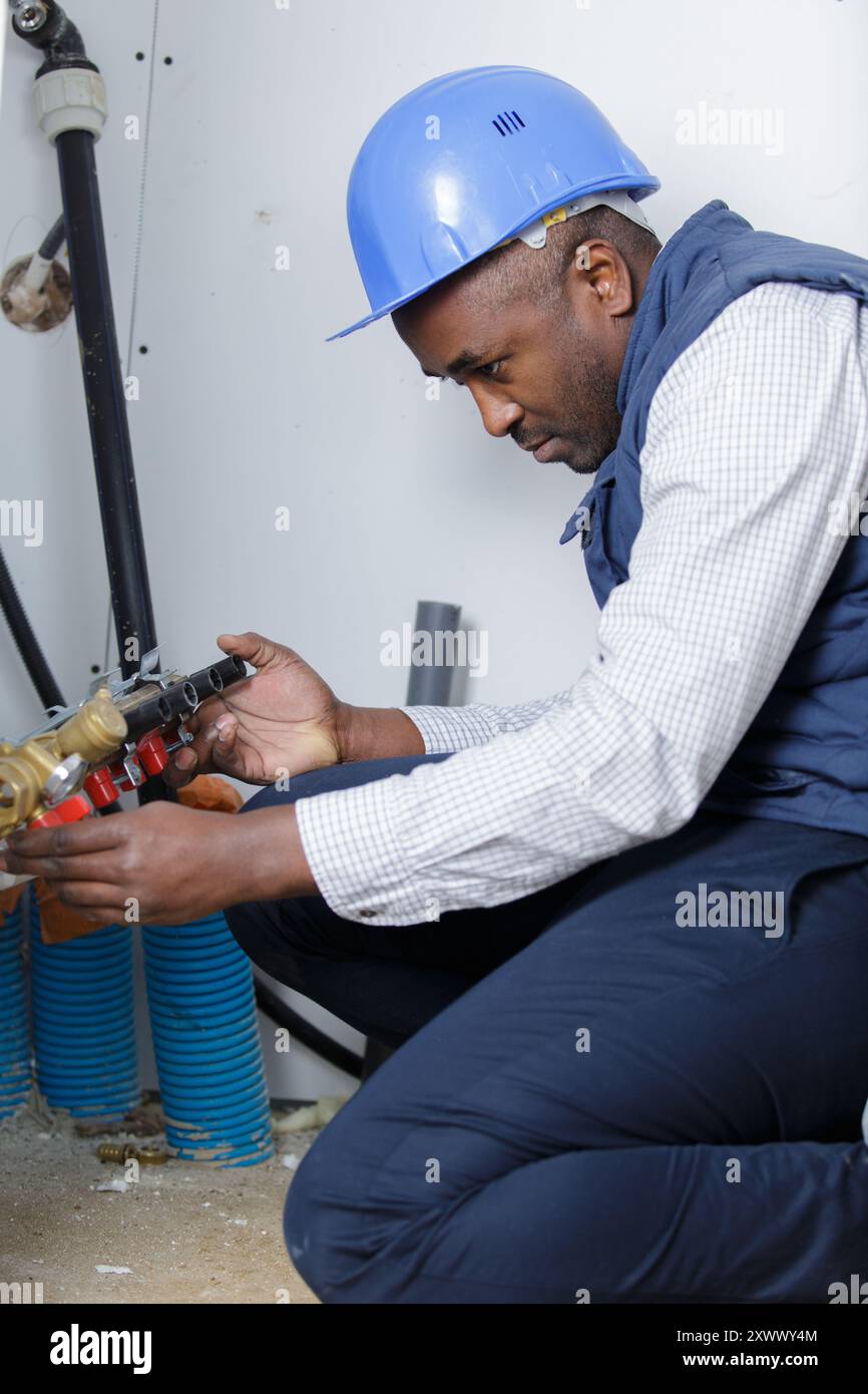 a man checks or inspection of cables Stock Photo - Alamy