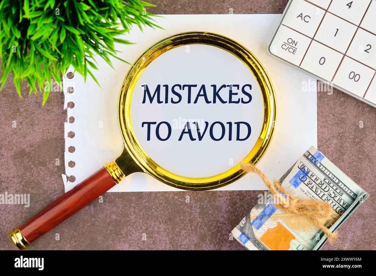 MISTAKES TO AVOID, text through a magnifying glass on a piece of paper ...