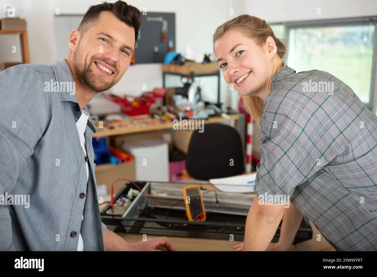 Two factory workers pointing hi-res stock photography and images - Alamy