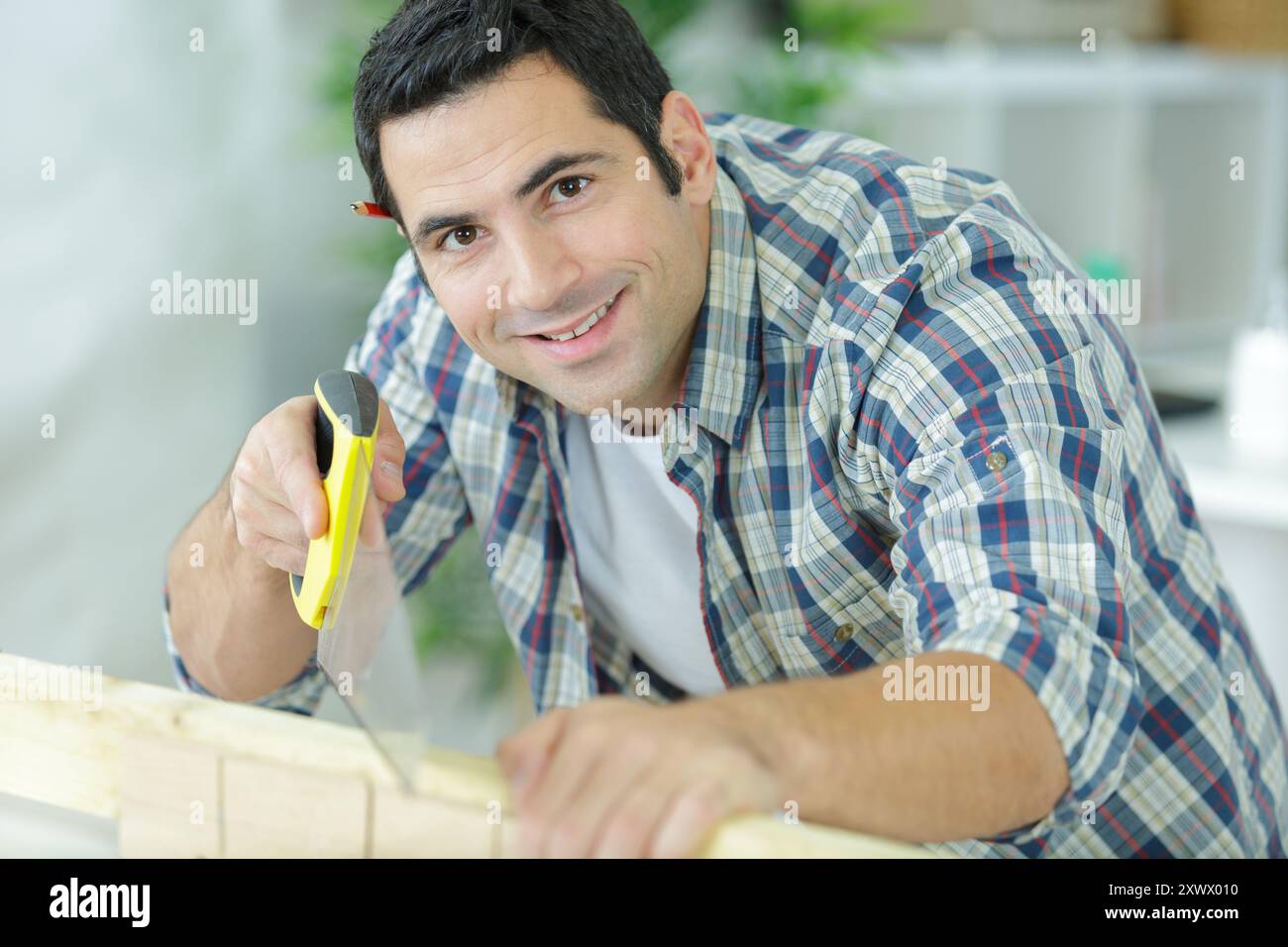 Serious carpenter in protective hi-res stock photography and images - Alamy