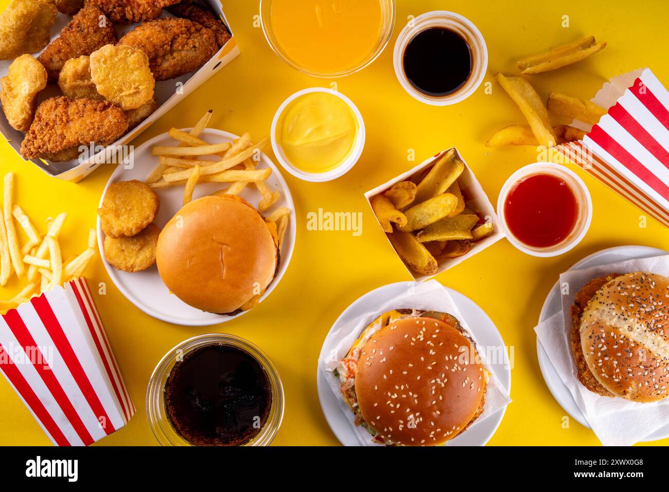 Fast food delivery menu background with various burgers, cheeseburger, nuggets, french fries ...