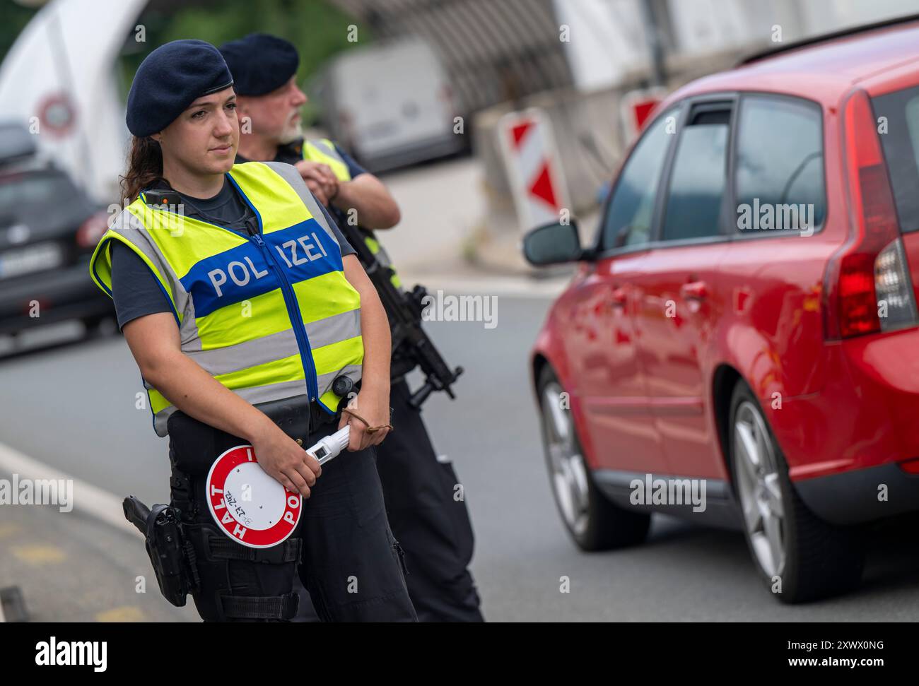 Walserberg, Austria. 20th Aug, 2024. Police officers carry out border ...