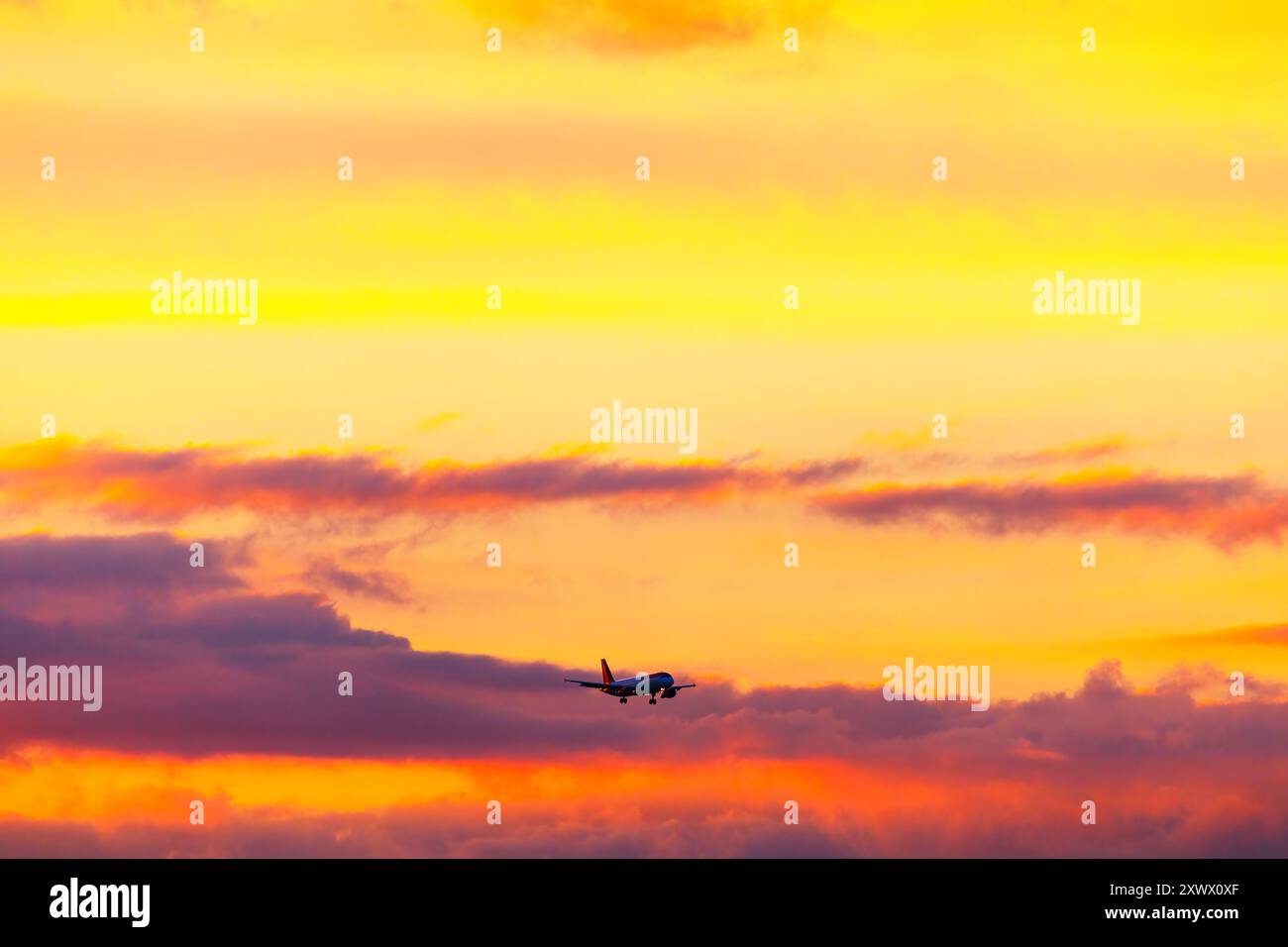 Jet flying across the sun hi-res stock photography and images - Alamy