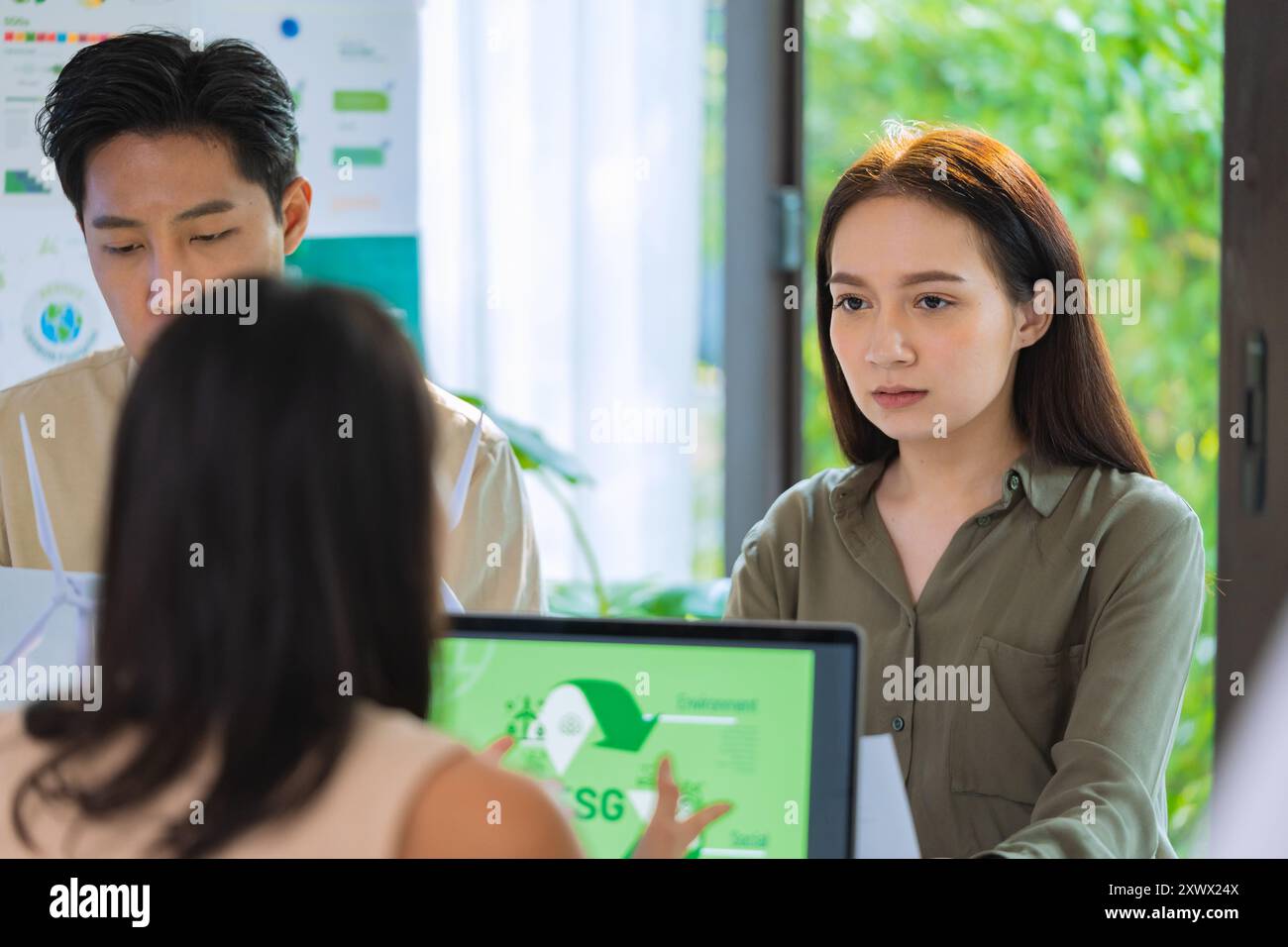 diversity team brainstorming discussion focused on ESG (environment,social,governance) for sdgs ...