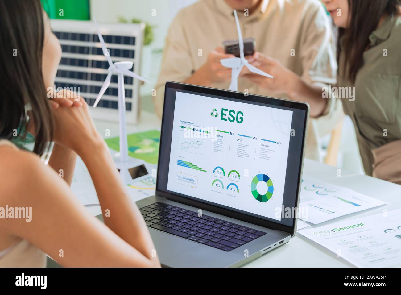 ESG ( environment, social,governance) recycle sign on laptop screen ...