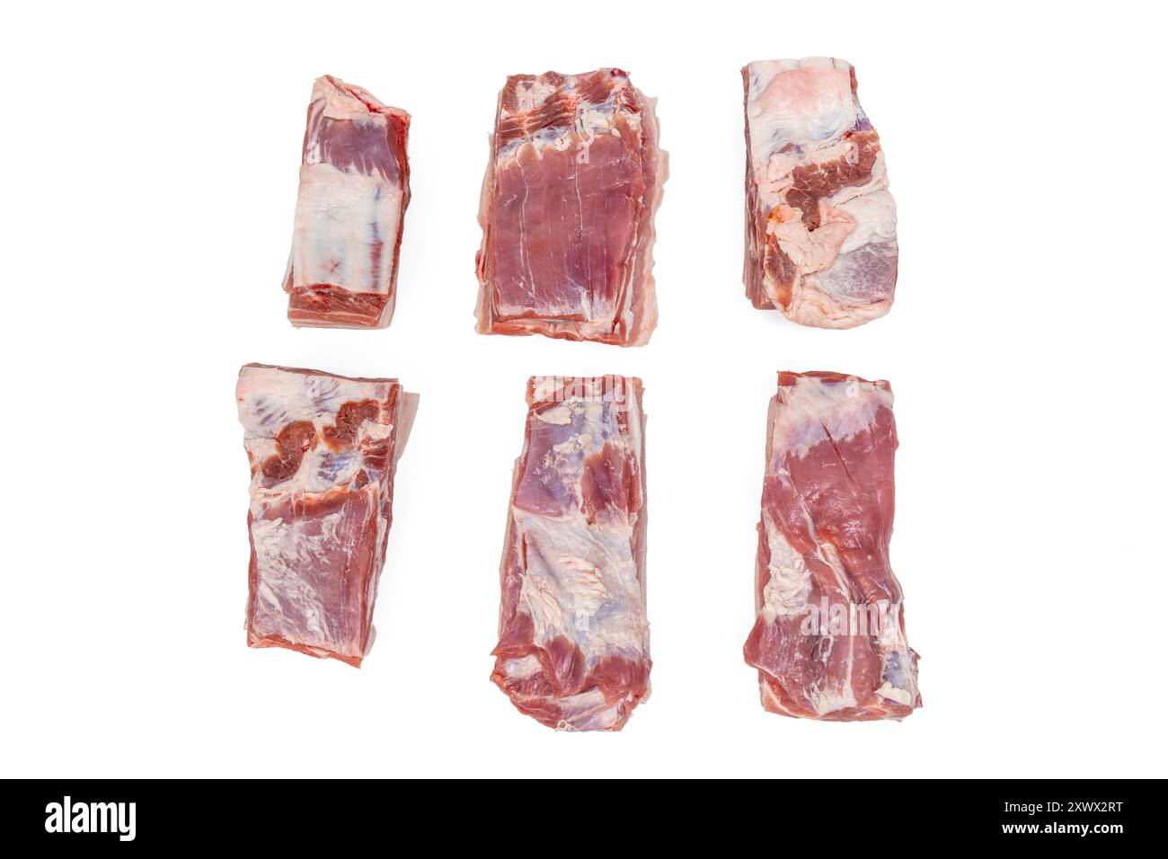 A close up of a piece of meat with a white background. The meat is cut ...