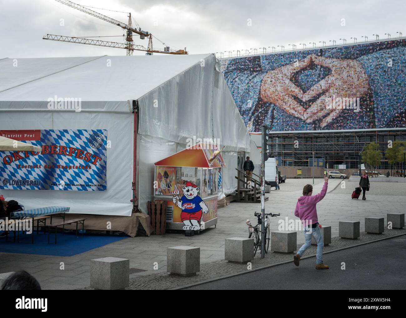 The image captures a vibrant Oktoberfest scene at Berlin’s main station ...
