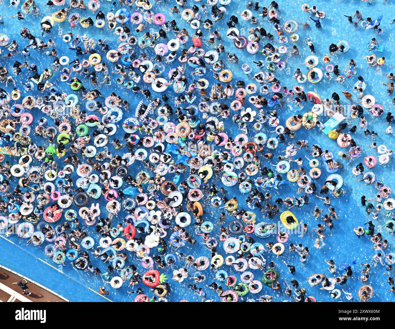 An aerial photo shows crowded Pool WAI, the summer-exclusive waterpark ...