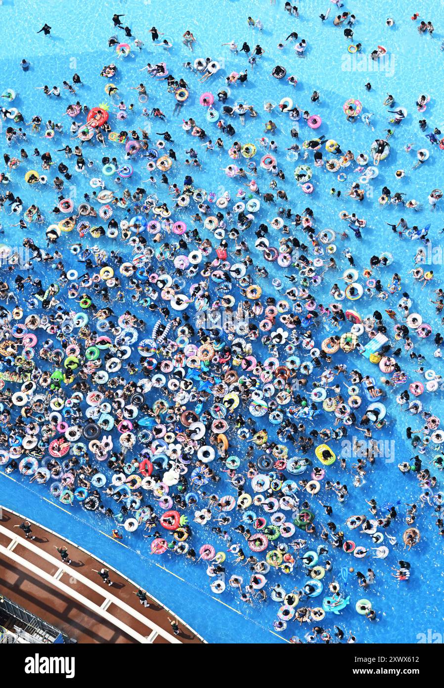 An aerial photo shows crowded Pool WAI, the summer-exclusive waterpark ...