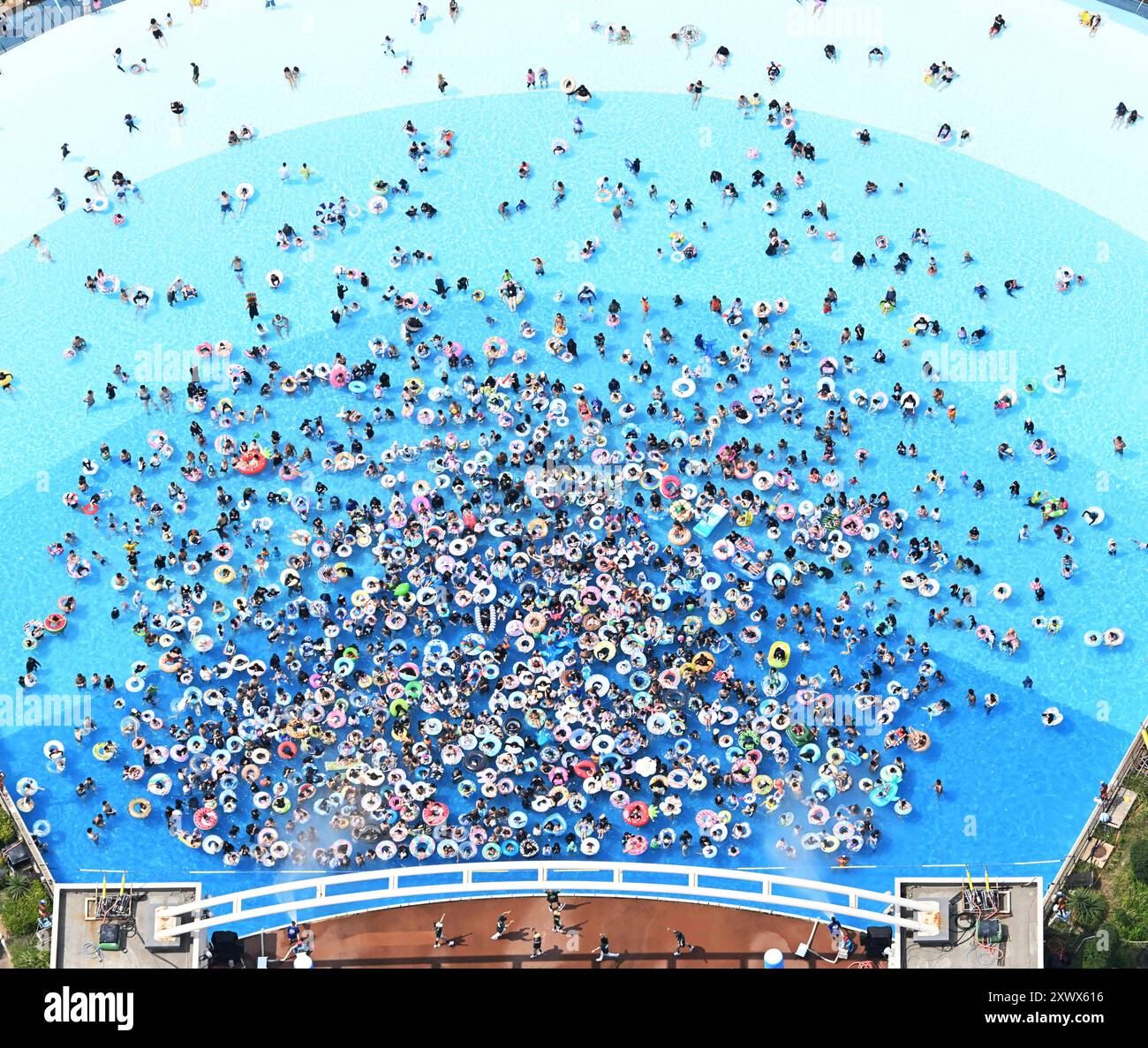 An aerial photo shows crowded Pool WAI, the summer-exclusive waterpark ...