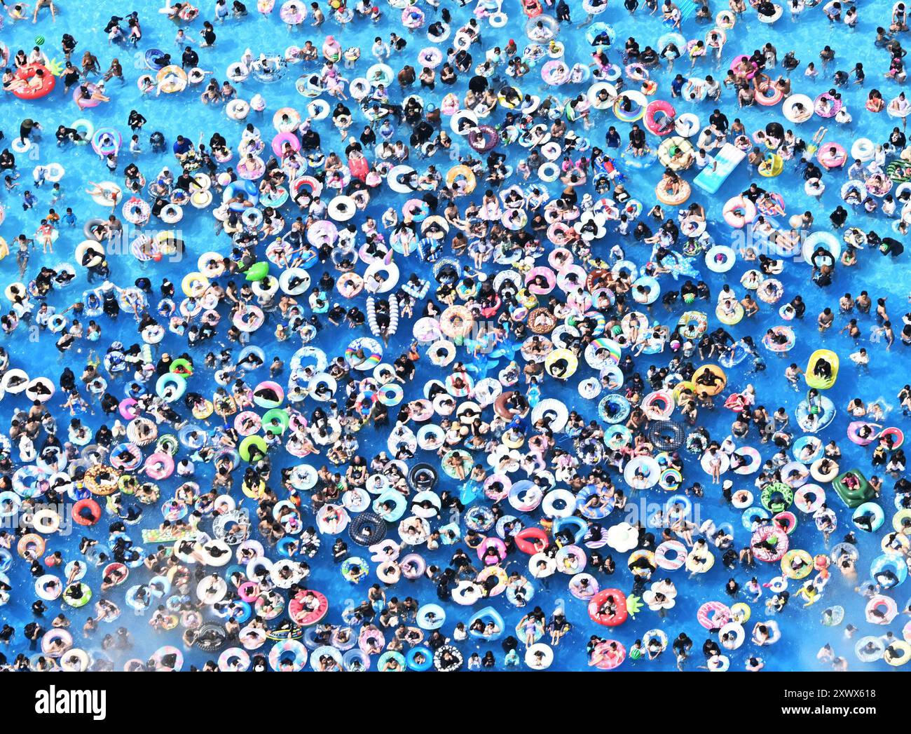 An aerial photo shows crowded Pool WAI, the summer-exclusive waterpark ...