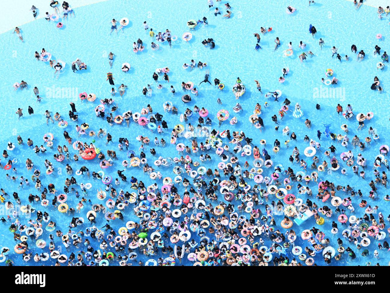 An aerial photo shows crowded Pool WAI, the summer-exclusive waterpark ...