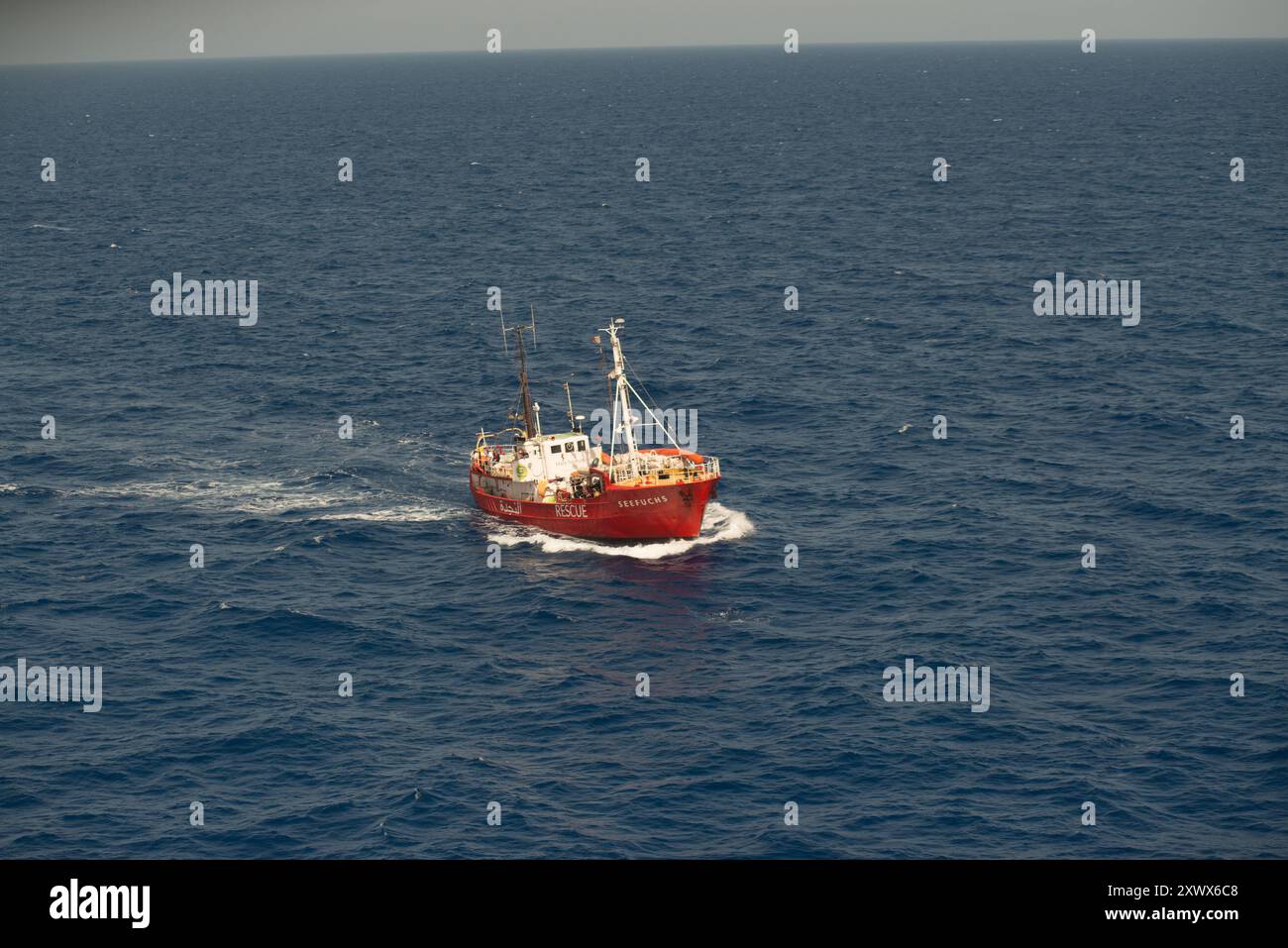 Aerial view of the Seefuchs boat navigating through the vast ...