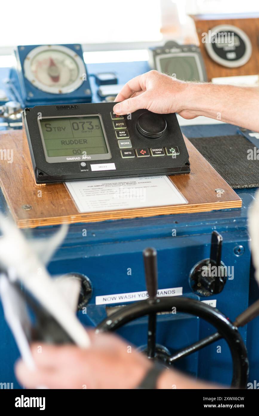 Boat captain steering ship in hi-res stock photography and images - Alamy