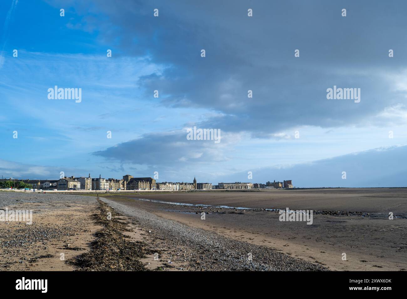Explore the serene beauty of Morecambe Bay, showcasing a wide expanse ...
