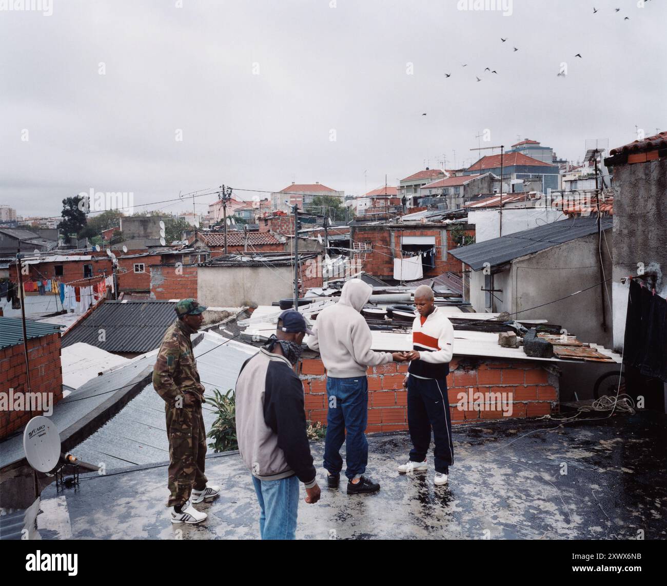 Young inhabitants of the Barrio 6 de Maio slum in Lisbon are seen ...