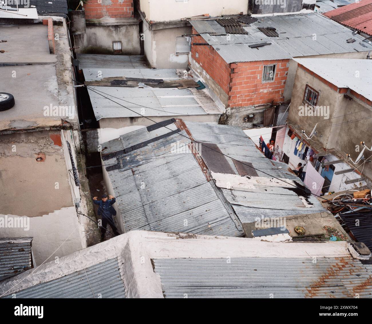 A resident from the slum Barrio 6 de Maio is shown performing a rap ...