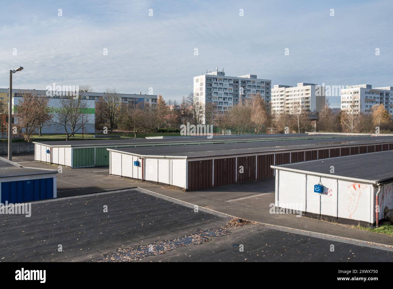 An urban view showcasing a complex of residential buildings surrounded ...